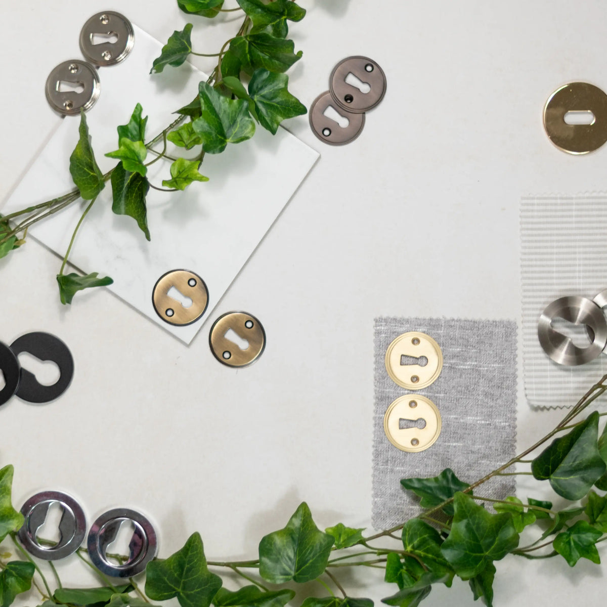 Millhouse Brass Key Escutcheons on Round Rose - Satin Nickel - Pair ...